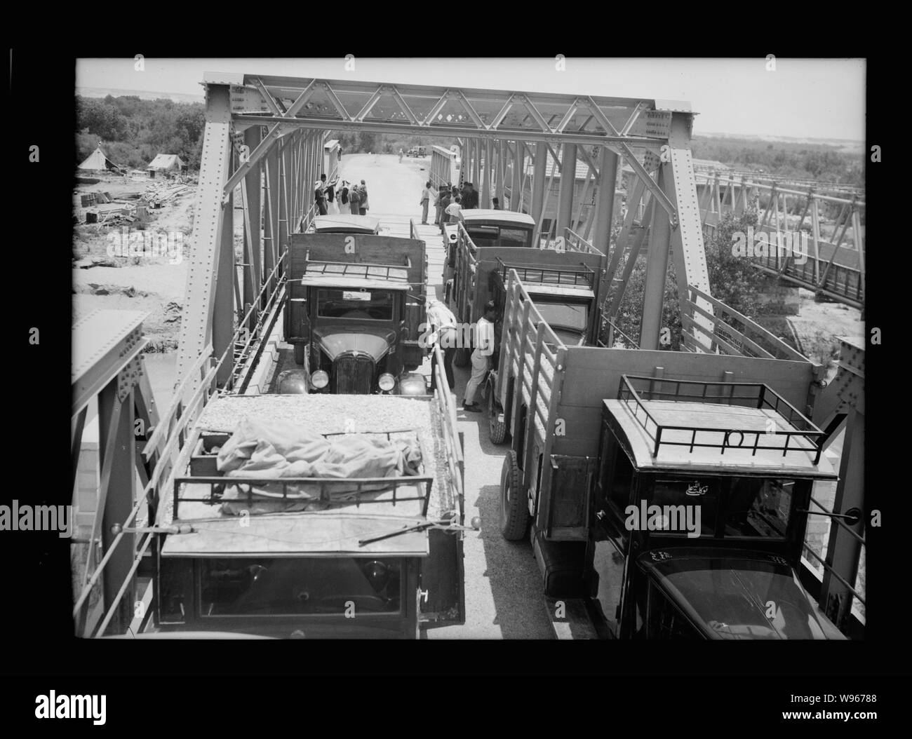 Allenby Bridge. Trucks on either side of the bridge Stock Photo - Alamy