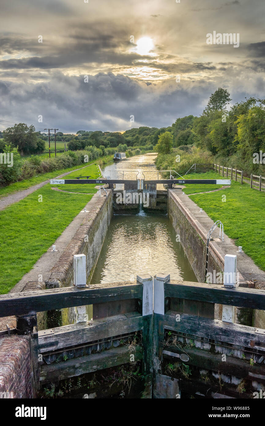 Canal lock during sunset at the Kennet and Avon Canal in Wiltshire ...