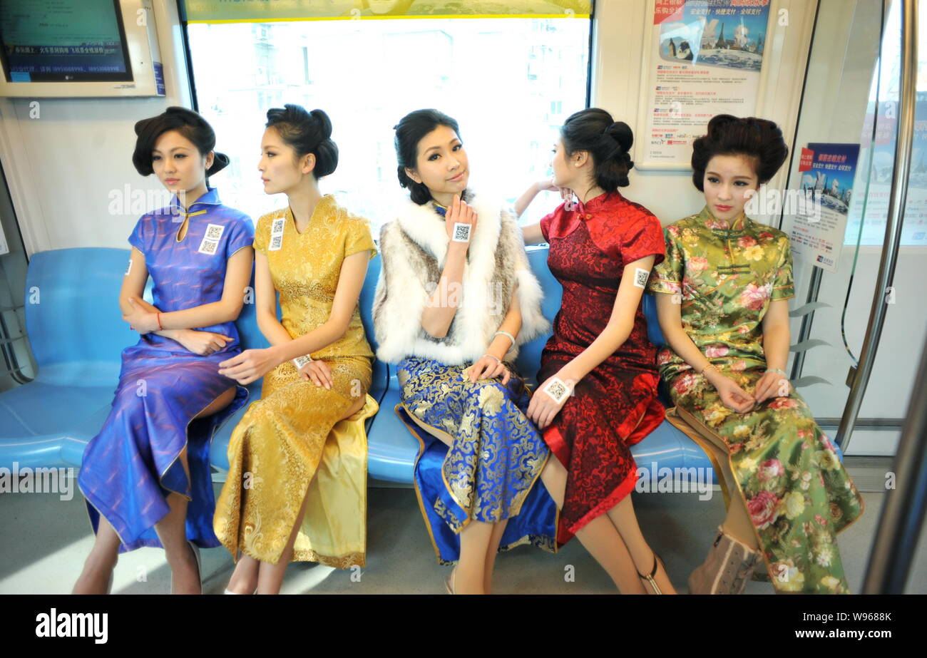 Chinese models wearing gorgeous cheongsams to promote the official ...