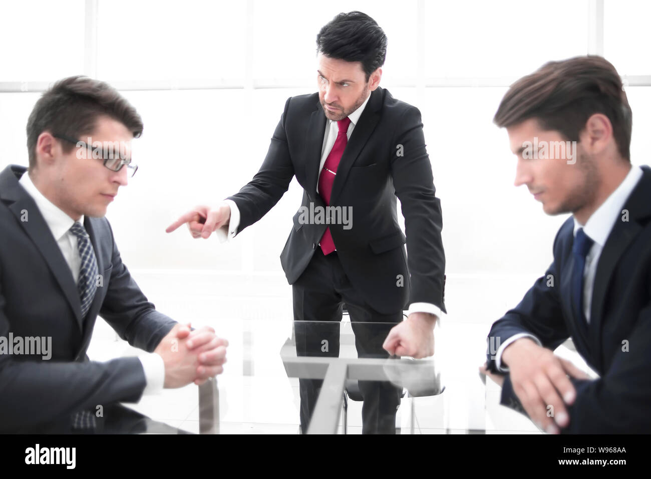 strict businessman scolds unprofessional employee Stock Photo - Alamy