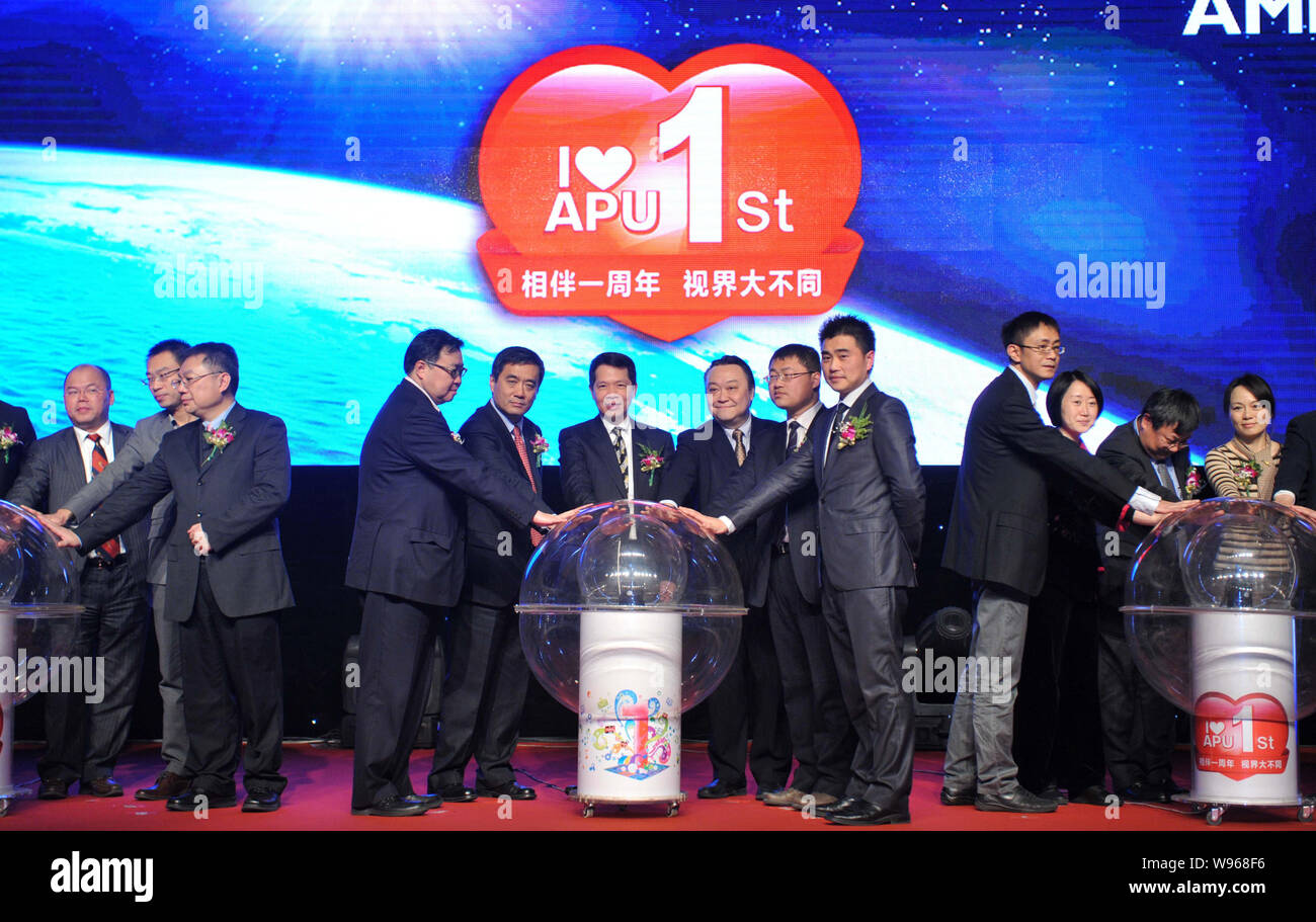 David Tang, center, Senior Vice President of AMD and President of AMD ...