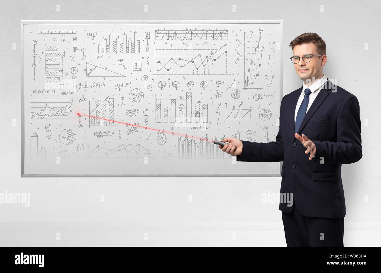 Professor with laser pointer teaching geometry Stock Photo - Alamy
