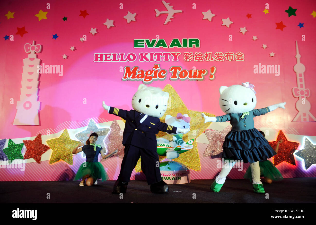 Entertainers dressed in Hello Kitty costumes perform at a launch ...