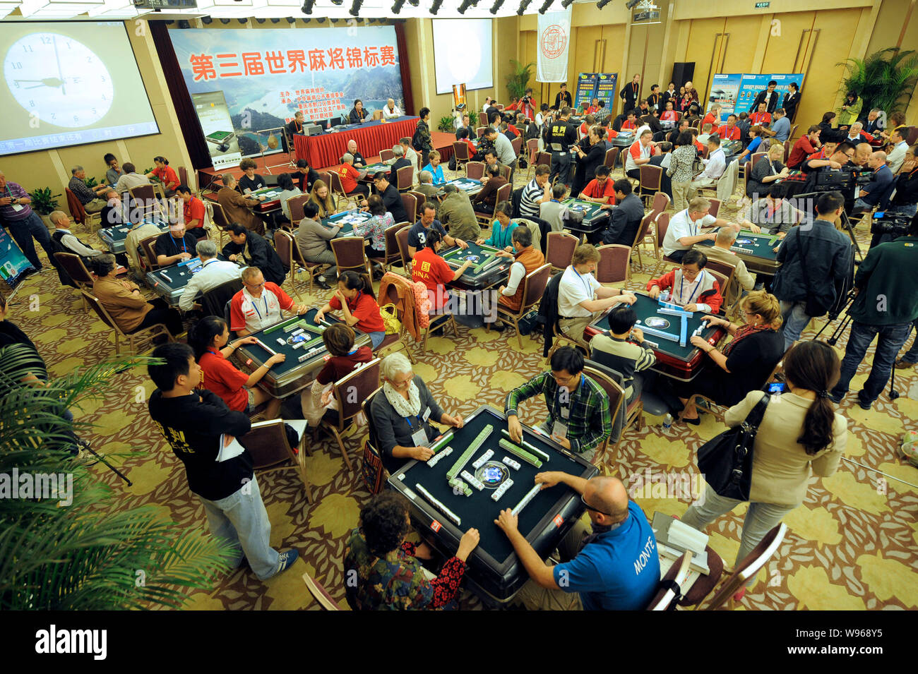 Participants compete during the 3rd World Mahjong Championship in ...