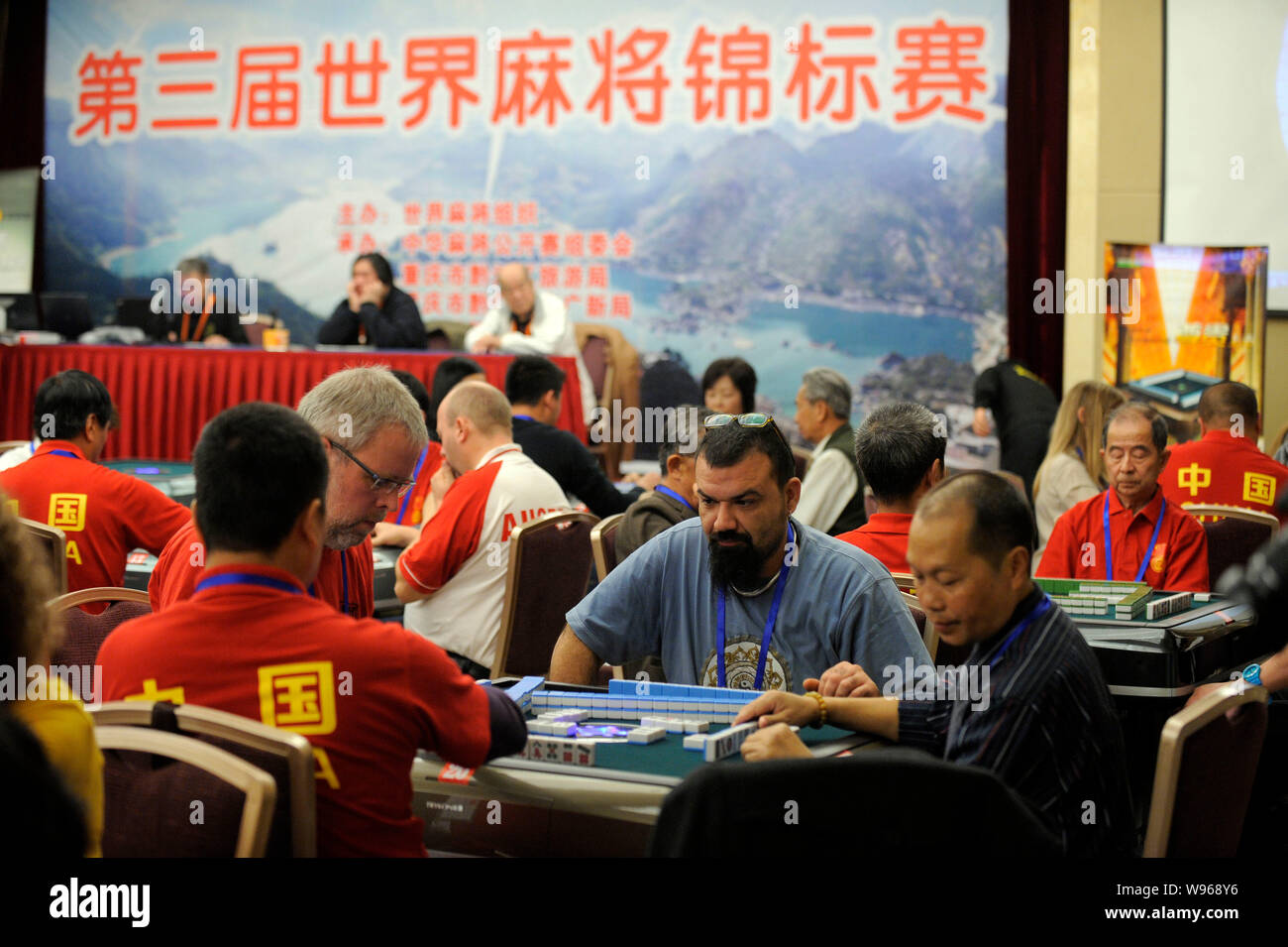 Participants compete during the 3rd World Mahjong Championship in ...