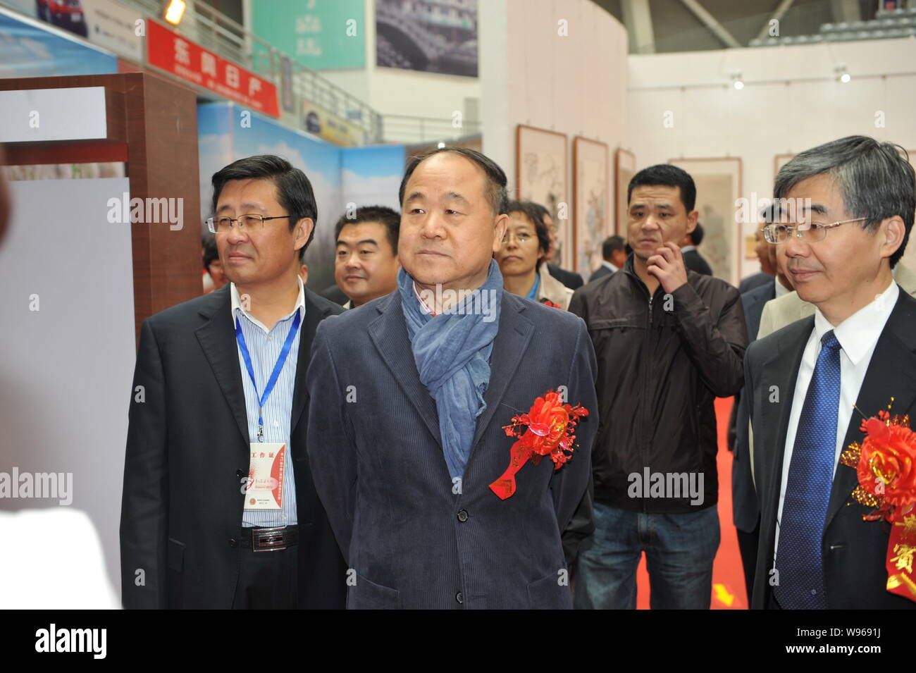 Chinese writer and Nobel Prize in Literature winner Guan Moye, center ...