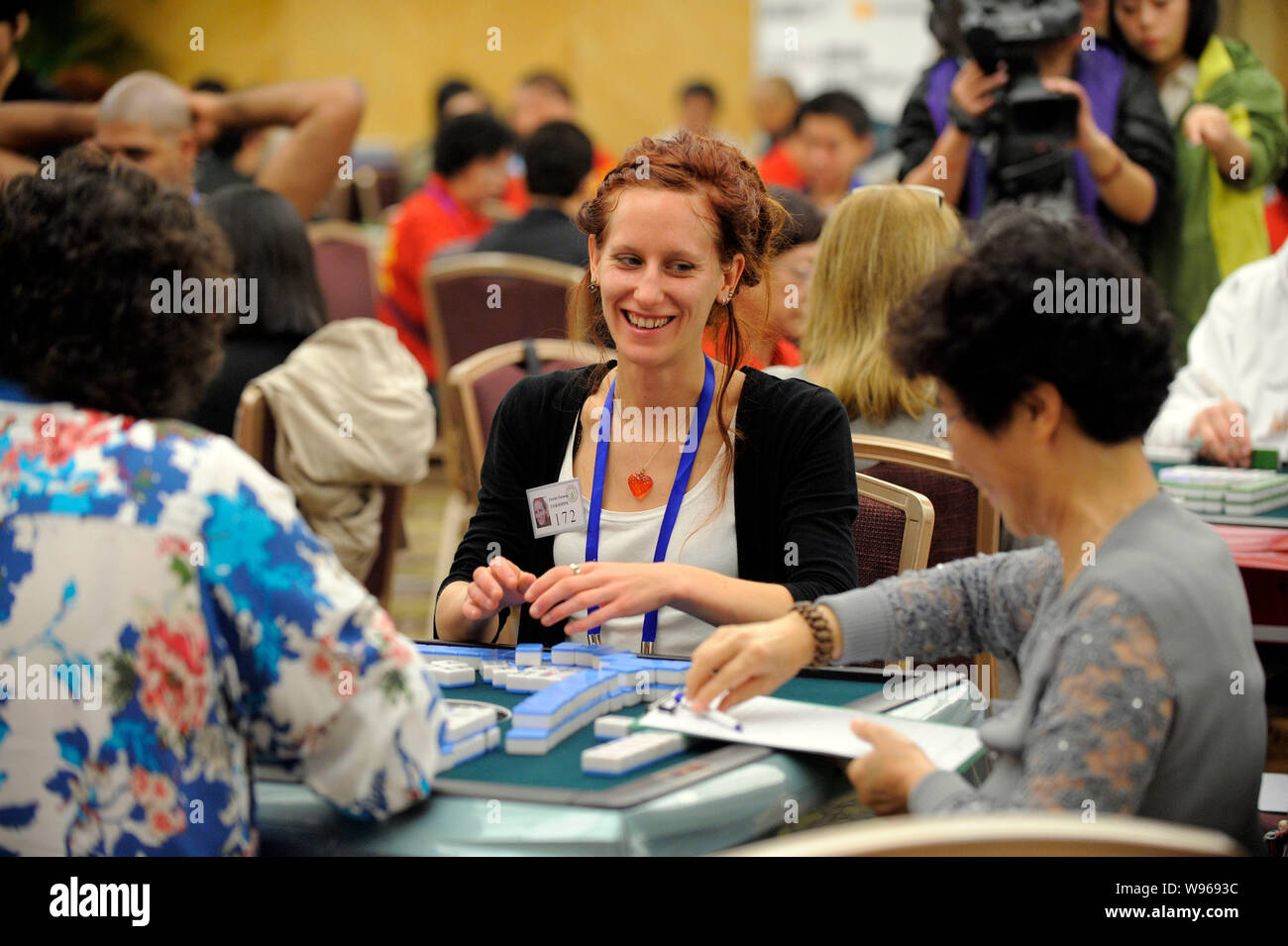 Participants compete during the 3rd World Mahjong Championship in ...