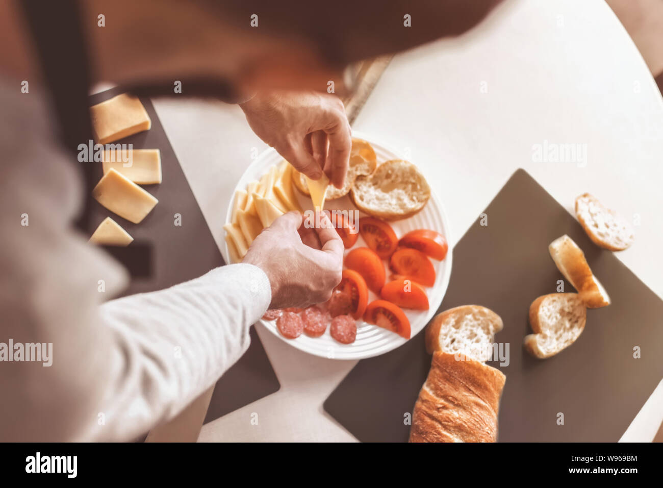Male hands preparing sandwiches hi-res stock photography and images - Alamy