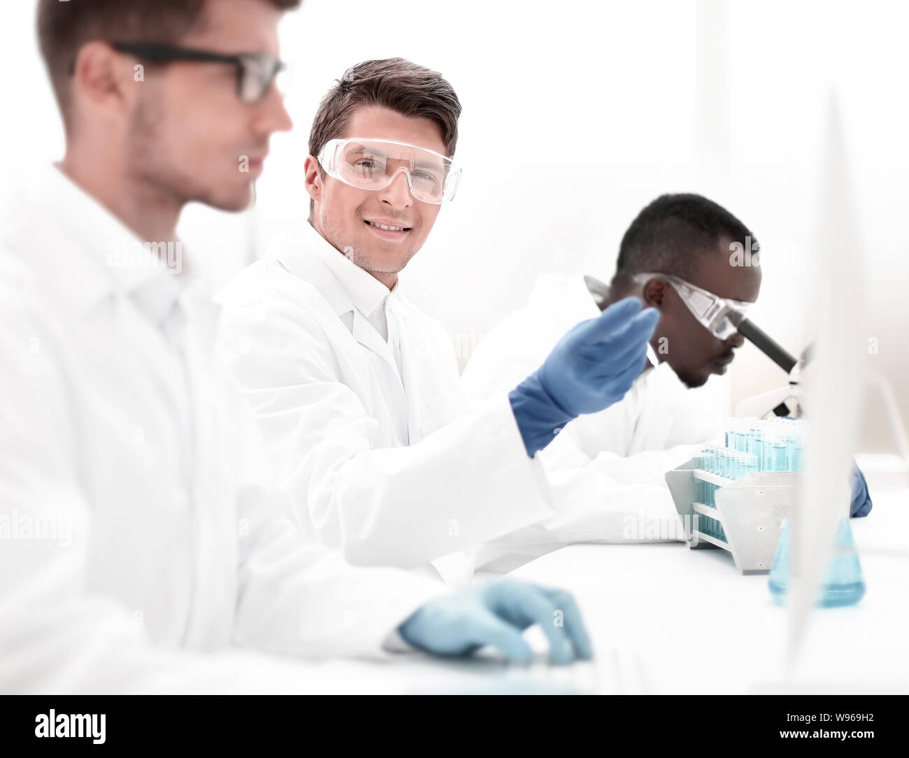 group of scientists are discussing new achievements Stock Photo - Alamy