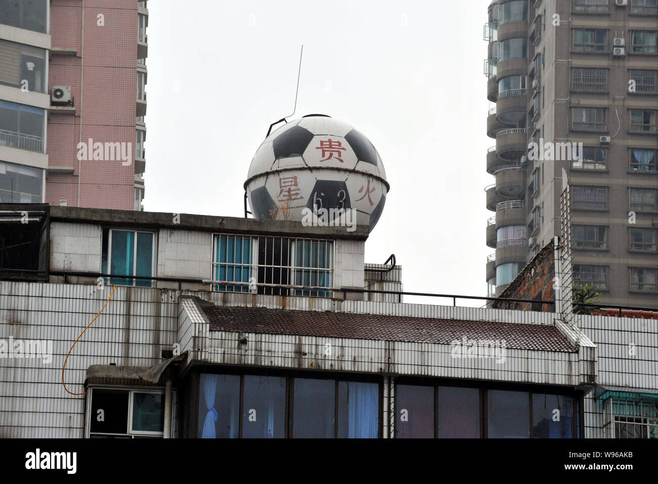 A football-shaped water tank supplying tap water is pictured on the ...
