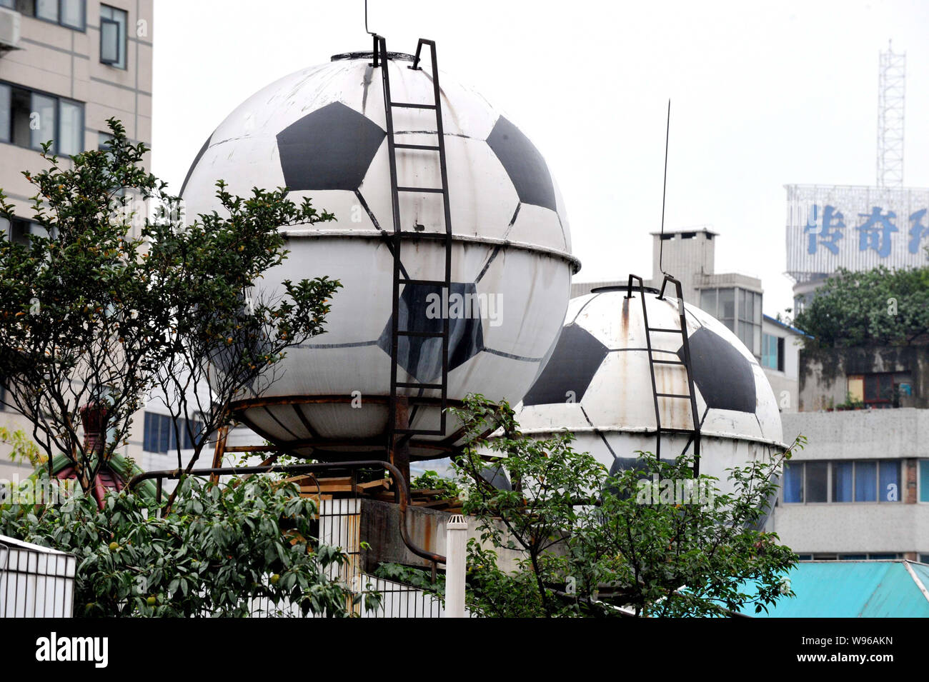 Football-shaped water tanks supplying tap water are pictured on the ...