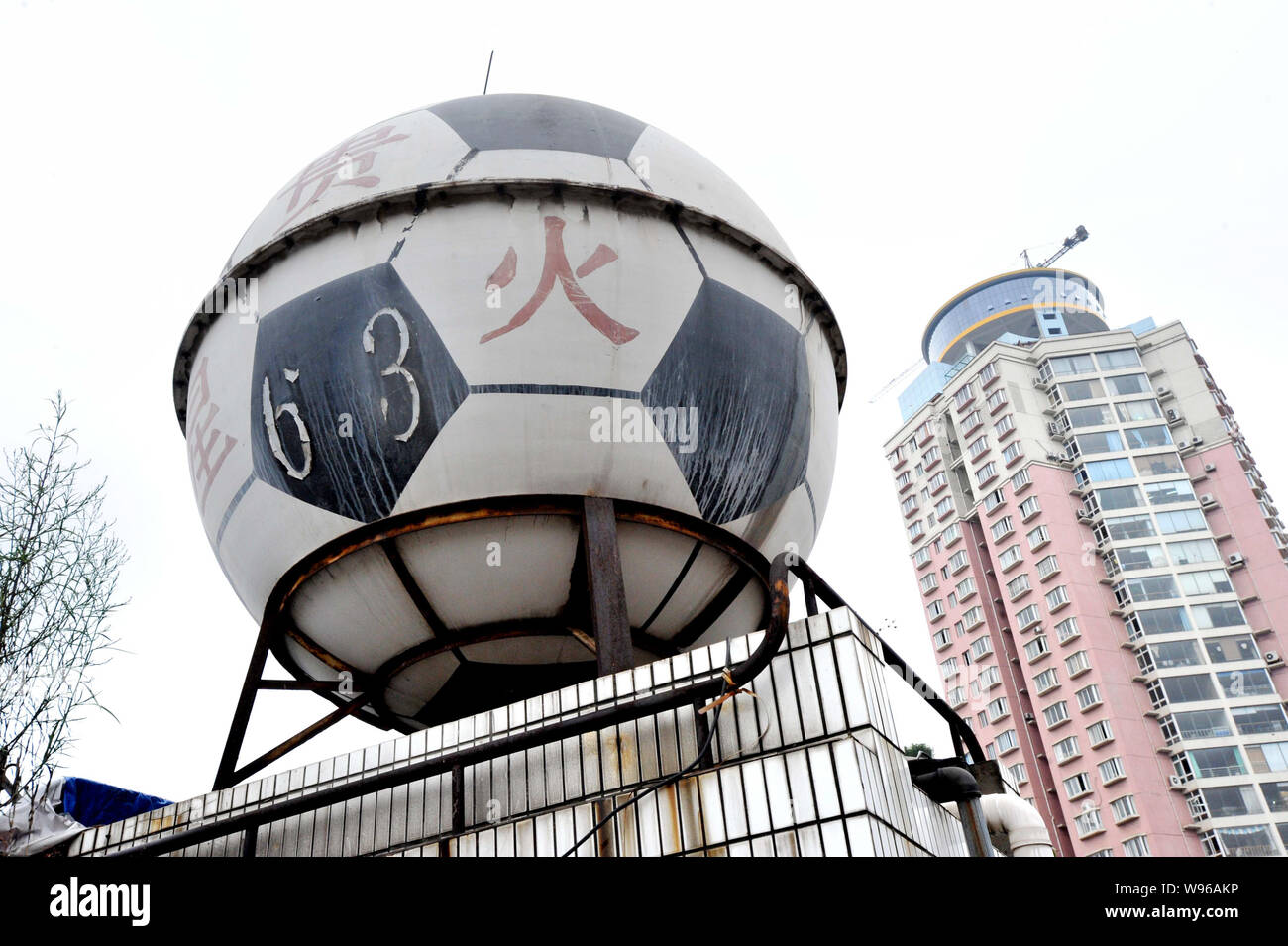 A football-shaped water tank supplying tap water is pictured on the ...