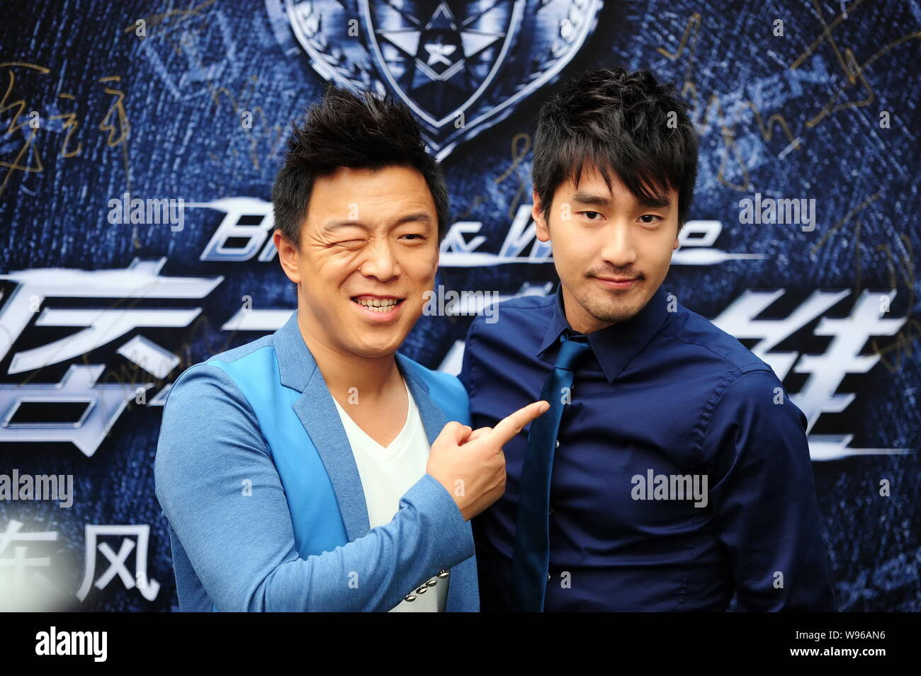 Chinese actor Huang Bo poses with Taiwanese actor Mark Chao during the ...