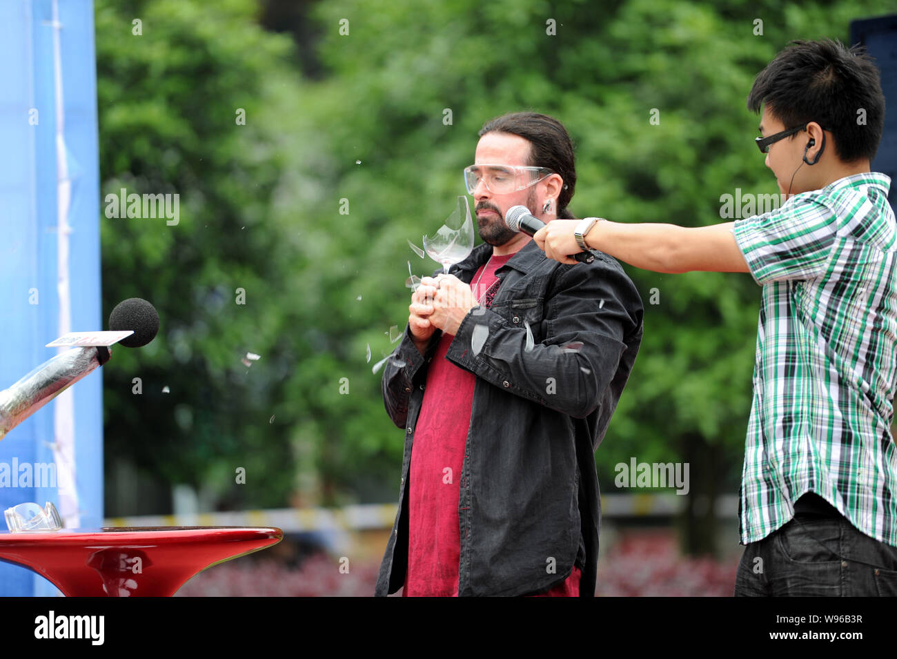 U.S. author and voice strengthening coach Jaime Vendera shatters a wine ...