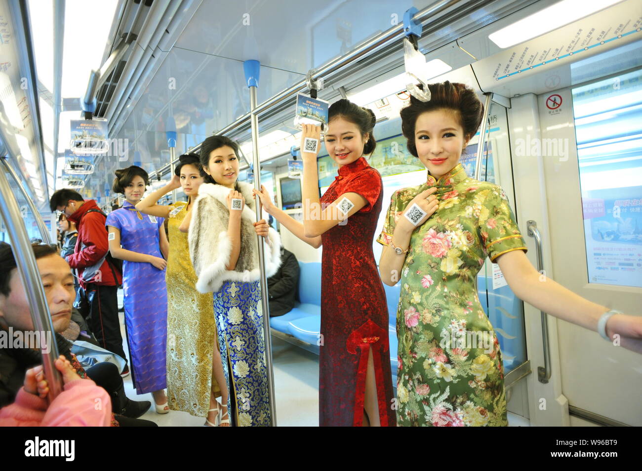 Chinese models wearing gorgeous cheongsams to promote the official ...