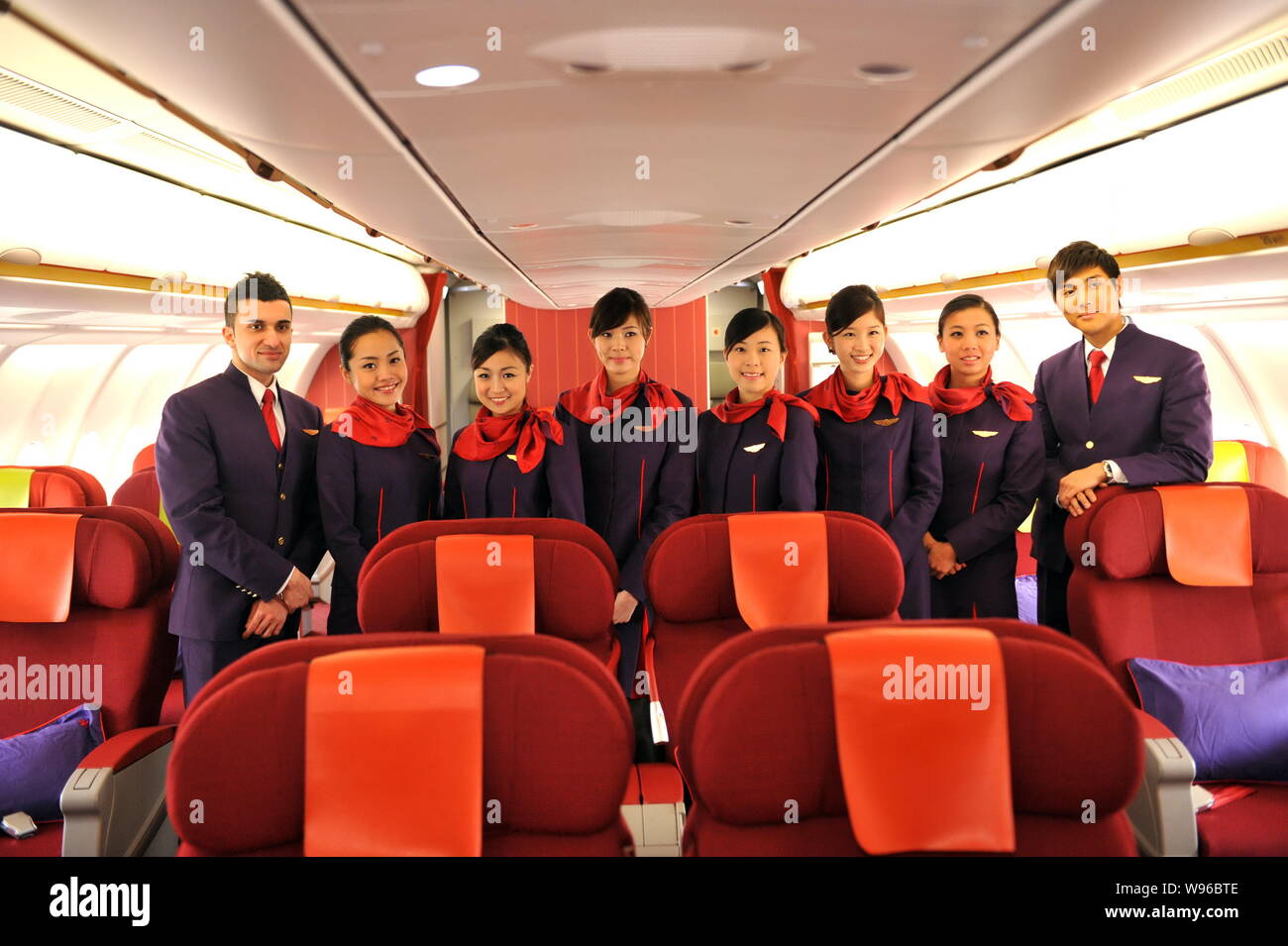 Staff pose at the class of the worlds first Airbus all-business class ...