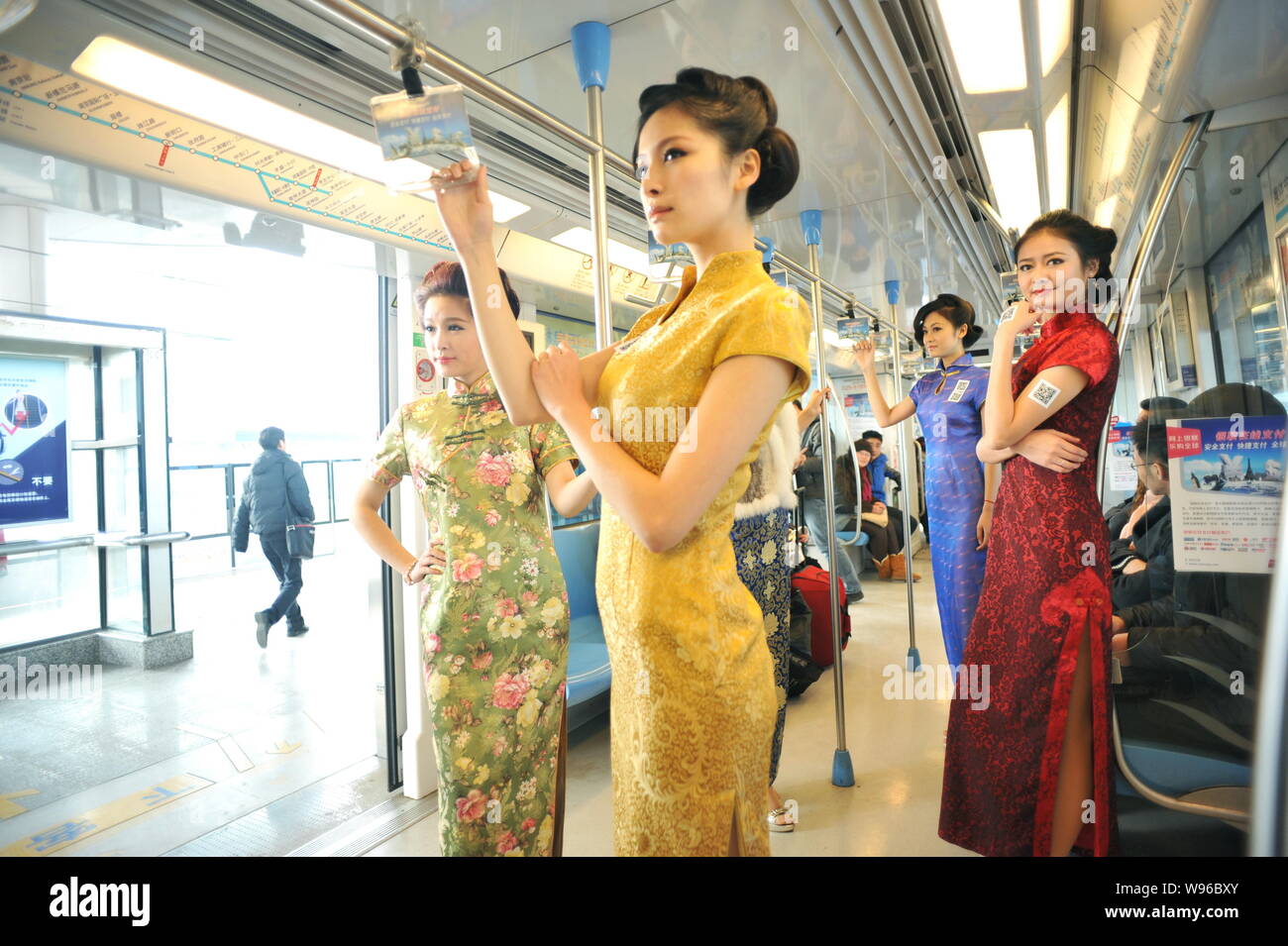 Chinese models wearing gorgeous cheongsams to promote the official ...