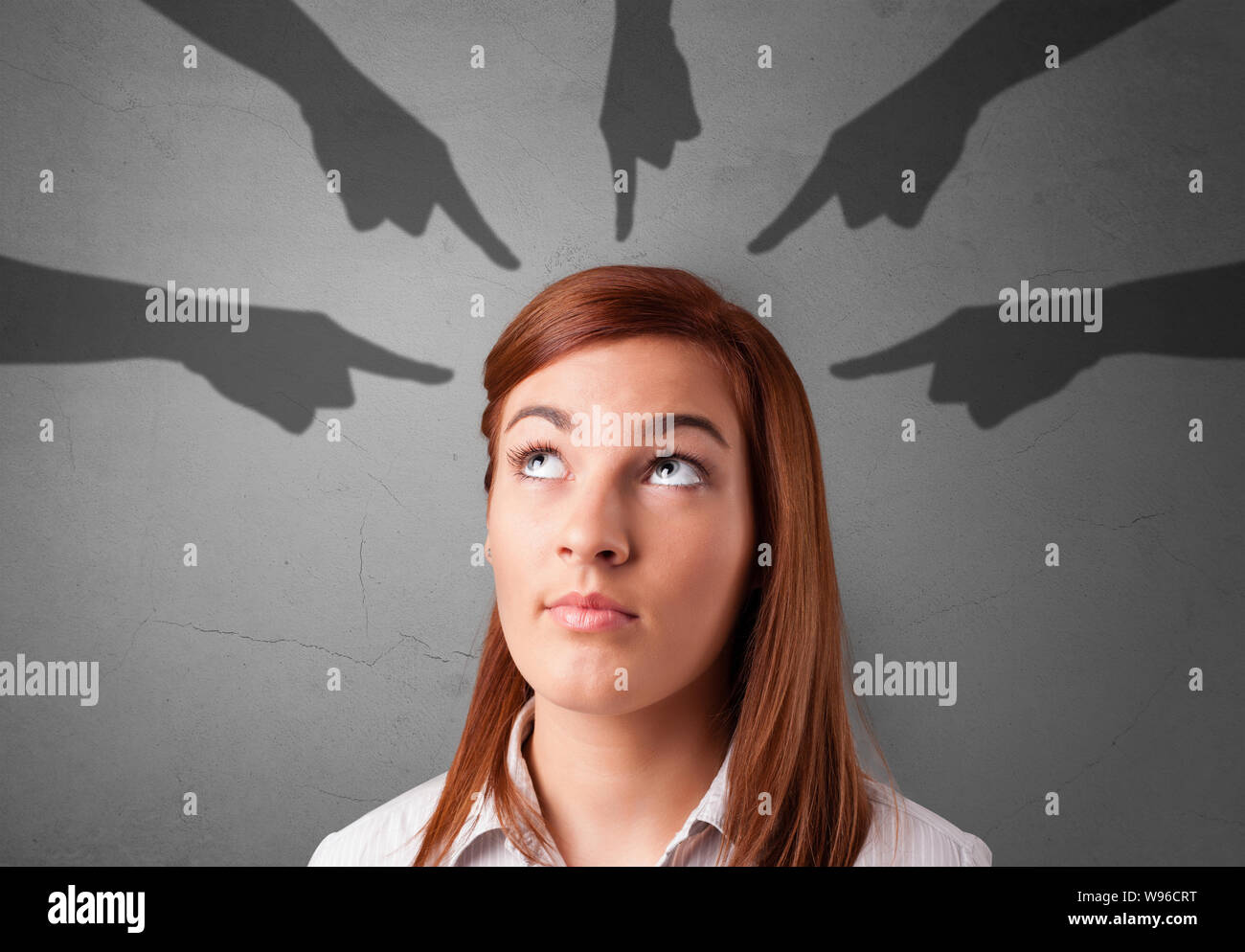 Young innocent student with pointing hands concept Stock Photo - Alamy