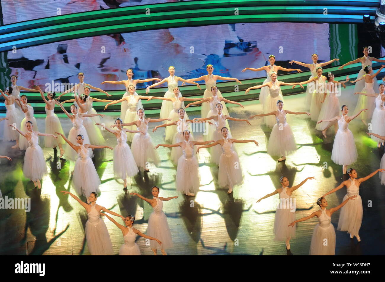 Dancers perform at Shanghai Culture Square during the opening ceremony ...