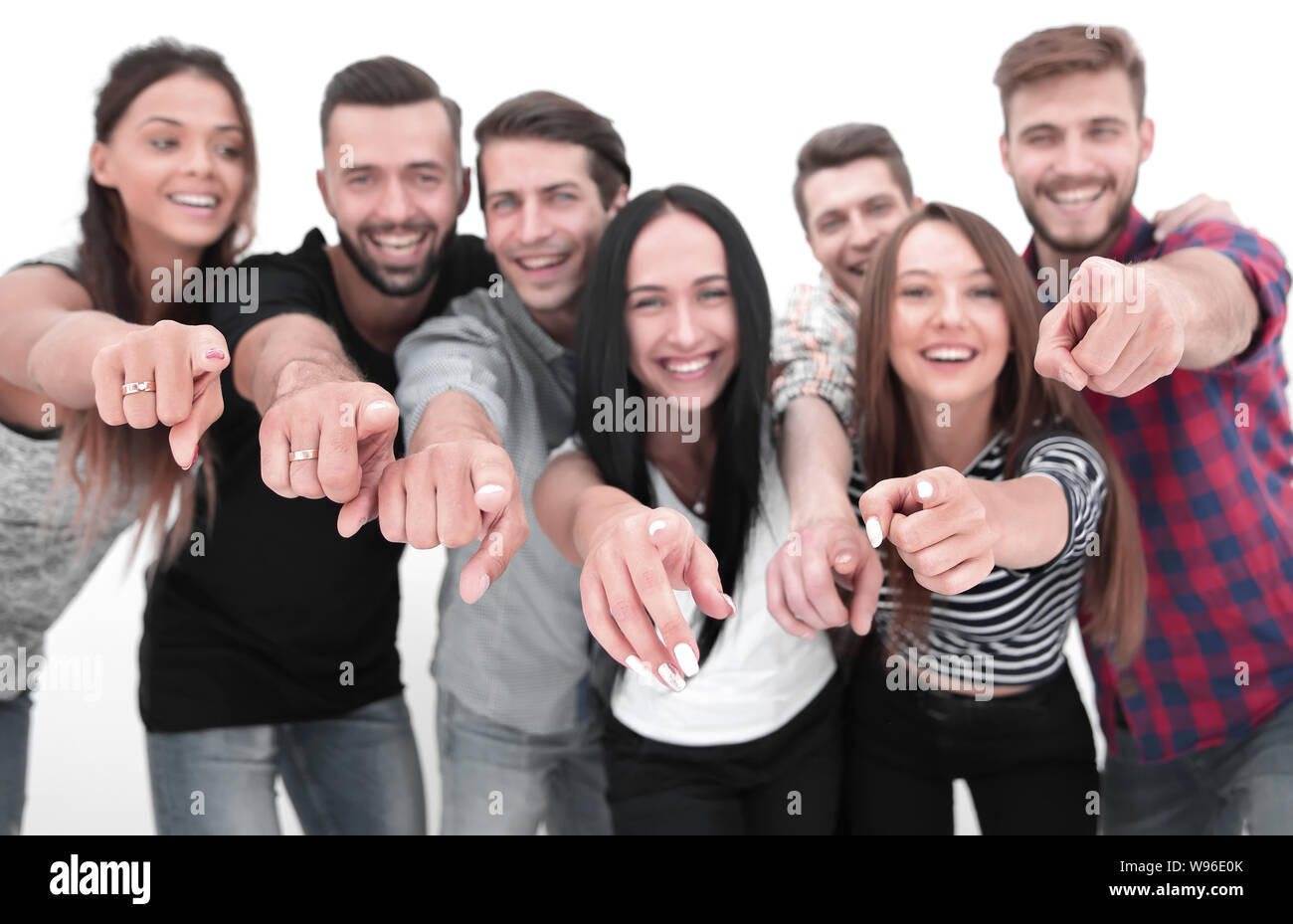 close up.a friendly team of young men pointing at you Stock Photo - Alamy