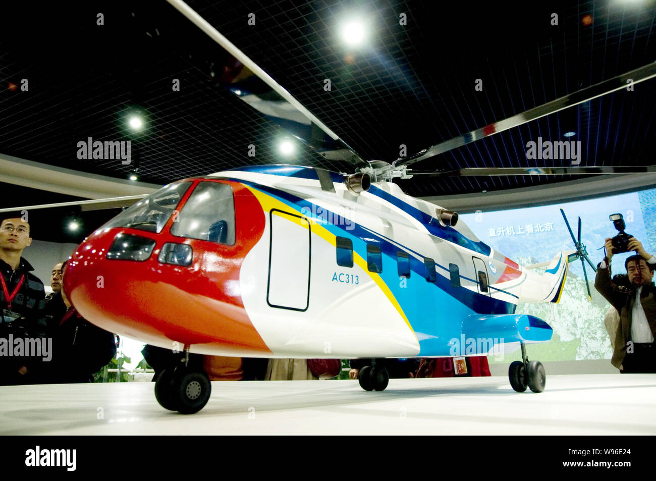 --FILE--Visitors look at a model of the AC313 civilian heavy helicopter ...