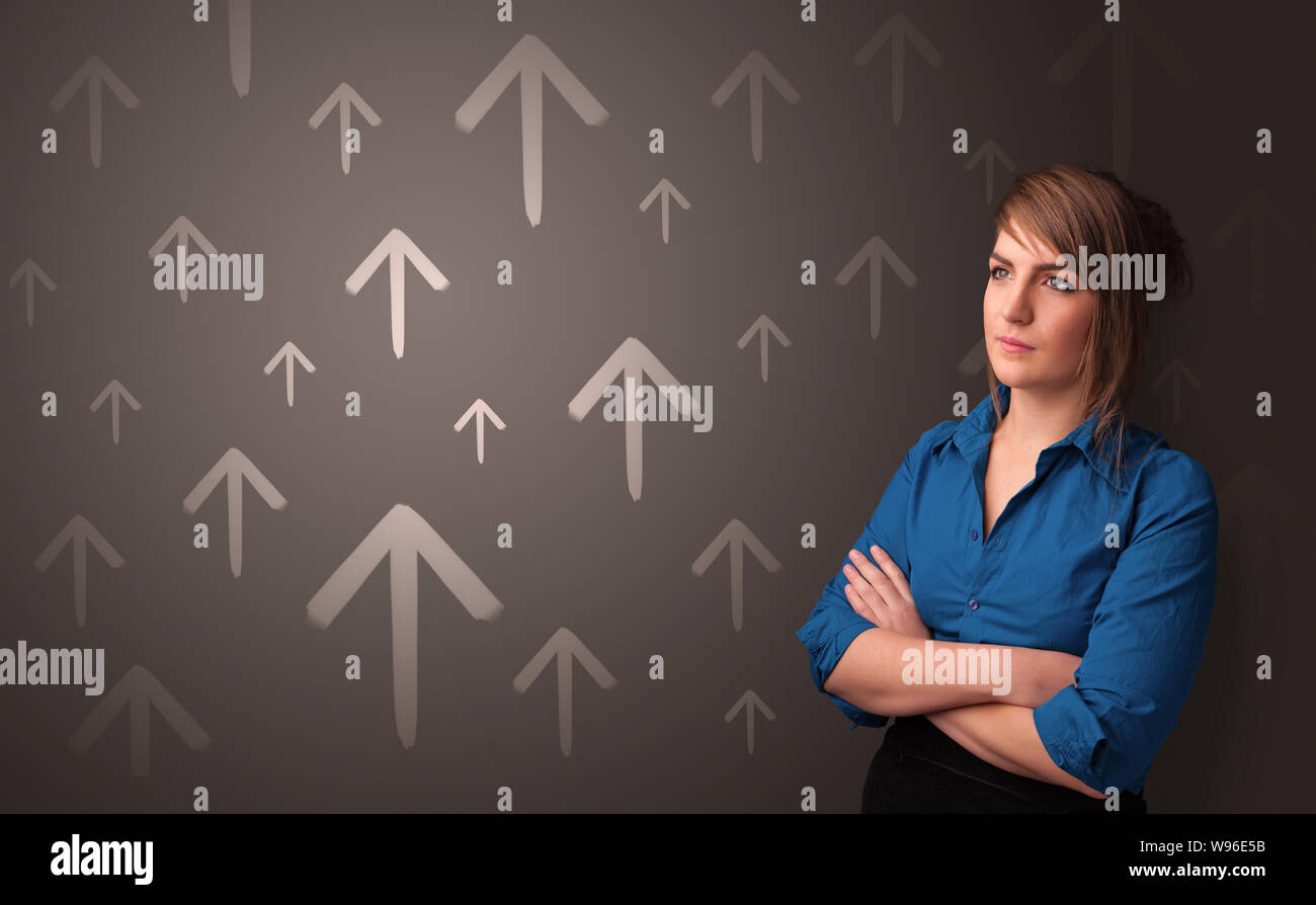 Young person thinking with direction concept background Stock Photo - Alamy