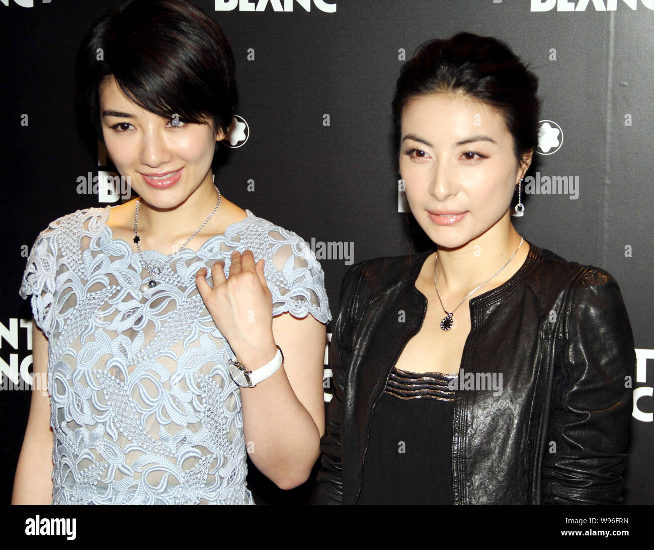 Chinese Olympic diving champion Guo Jingjing, right, and Chinese ...