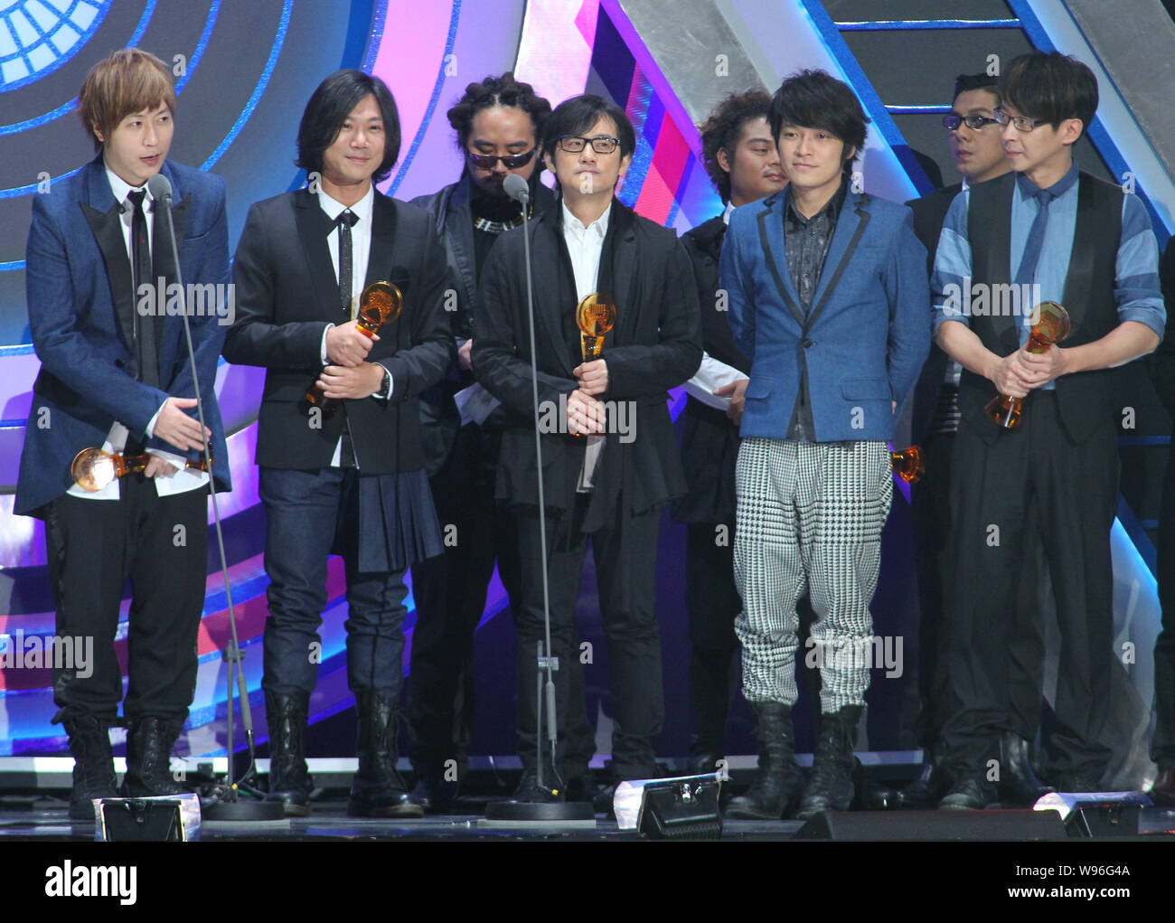 Taiwanese rock band Mayday receive the trophies for Best Bend, and the ...