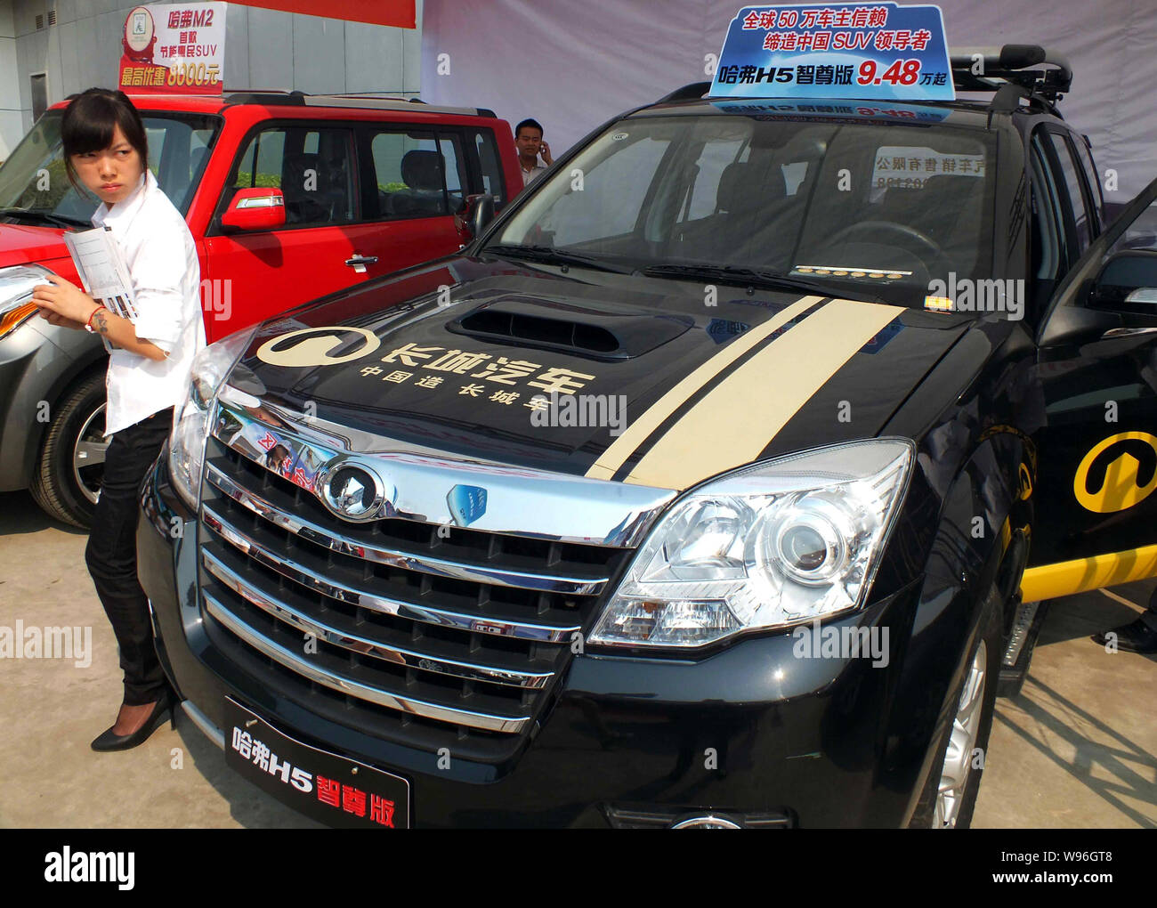 --FILE--Haval H5 and M2 SUVs of Great Wall Motor are seen on display during an auto show in ...