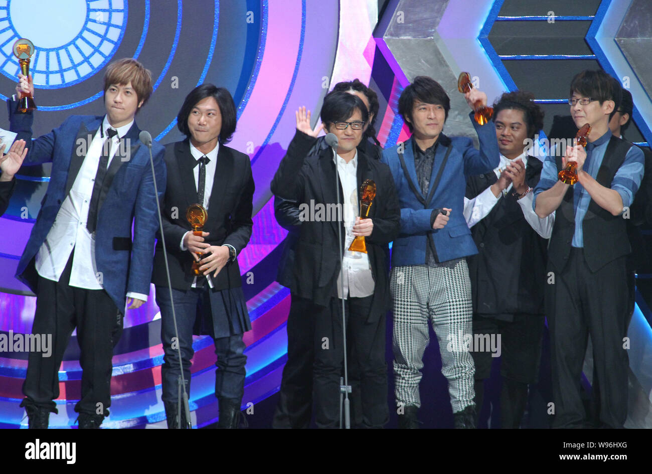 Taiwanese rock band Mayday receive the trophies for Best Bend, and the ...