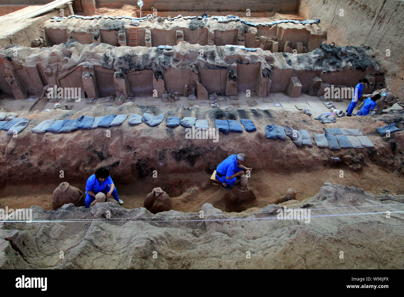 Chinese archaeologists excavate terracotta warriors in the No.1 Pit at ...