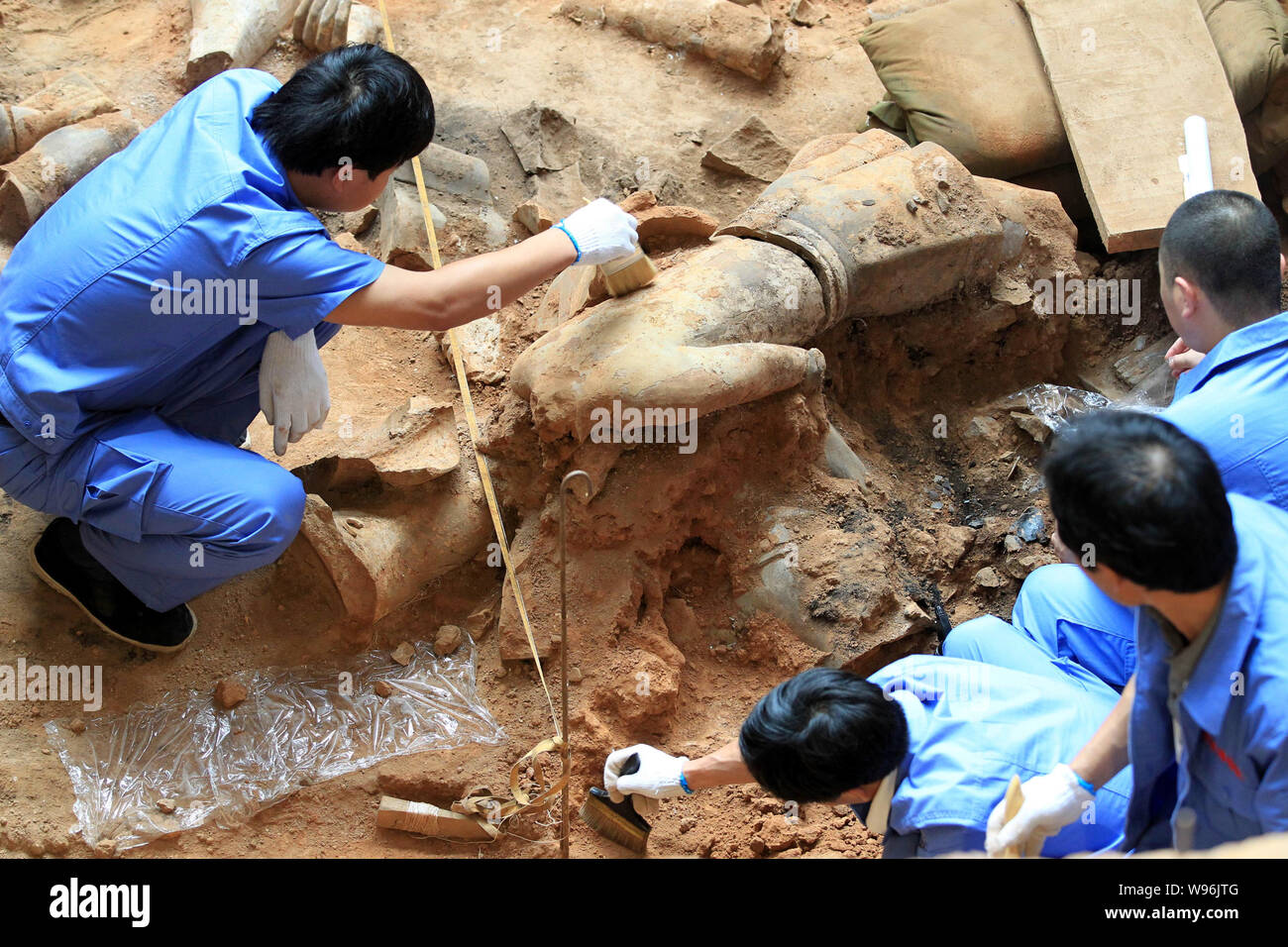 Chinese archaeologists excavate terracotta warriors in the No.1 Pit at ...