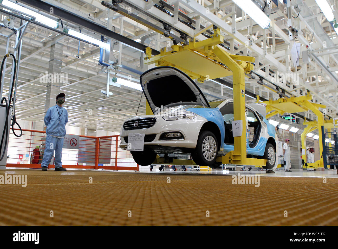 A Fiat Viaggio car passes through the assembly line at the GAC Fiat WCM ...