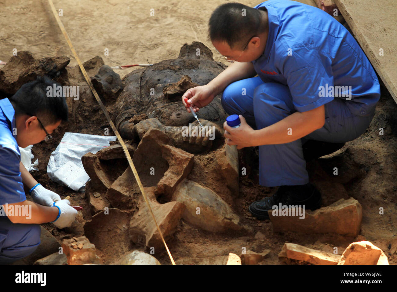 Chinese archaeologists excavate terracotta warriors in the No.1 Pit at ...