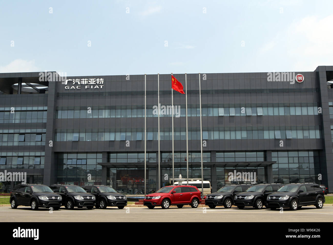 Fiat cars are displayed in front of the main building at the GAC Fiat ...
