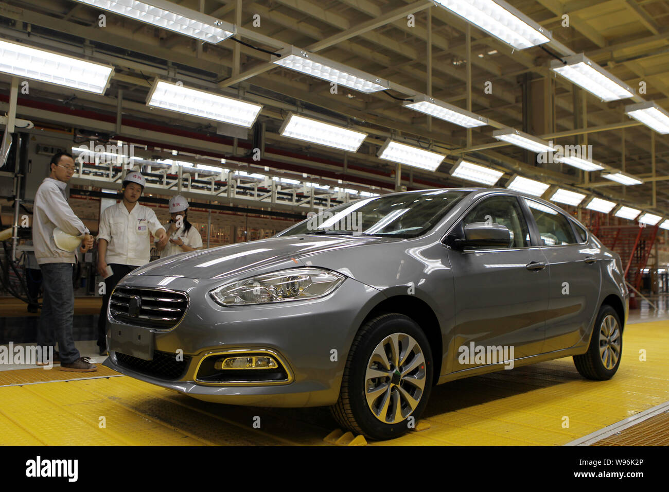 A Fiat Viaggio car passes through the assembly line at the GAC Fiat WCM ...