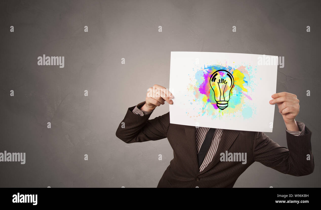 Person holding a paper with a drawn colorful idea concept Stock Photo ...
