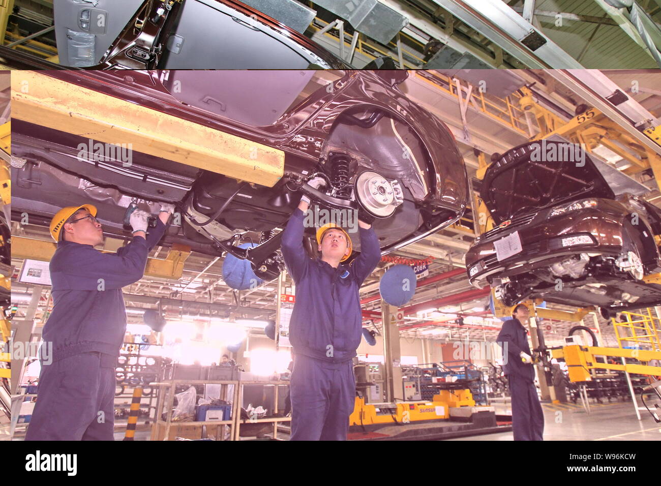 --FILE--Chinese factory workers assemble Geely Emgrand cars on the ...