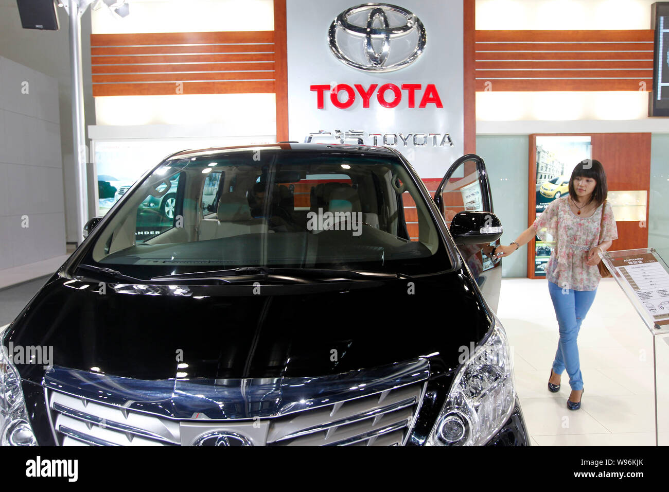 --File--A visitor is seen at the stand of Toyota during an auto show in ...