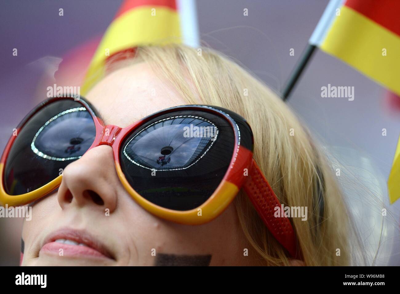 A football fan of Germany is pictured before the semifinal match ...