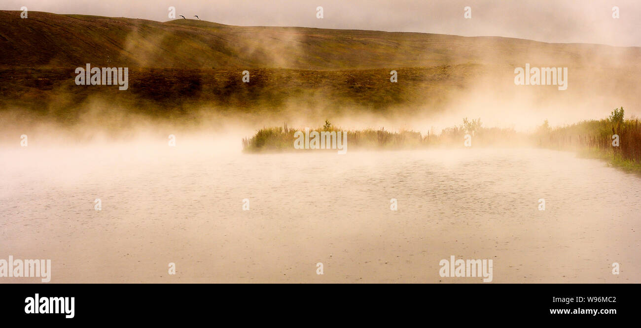 Natural hot-water pool near Husavik. Iceland Stock Photo - Alamy
