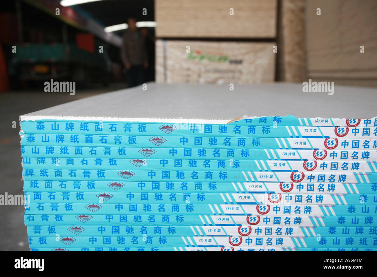 --FILE--Plasterboards manufactured by Taishan Gypsum Co., Ltd. are ...