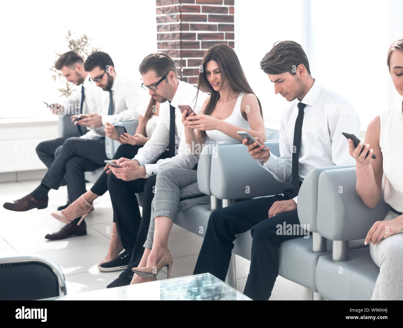 group of young people waiting for an interview Stock Photo - Alamy