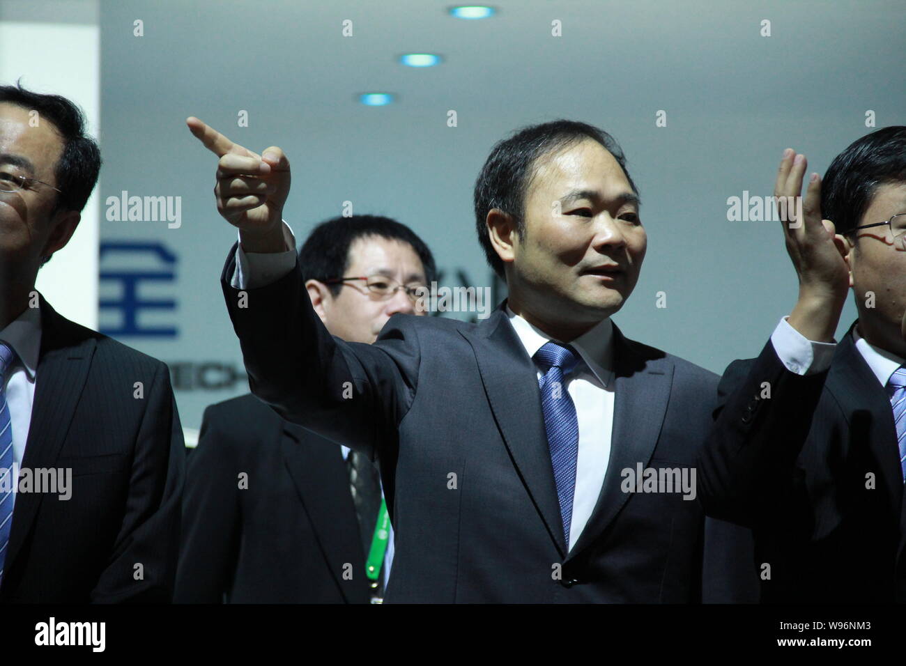Li Shufu (C), Chairman of Zhejiang Geely Holding Group Co. Ltd., is ...
