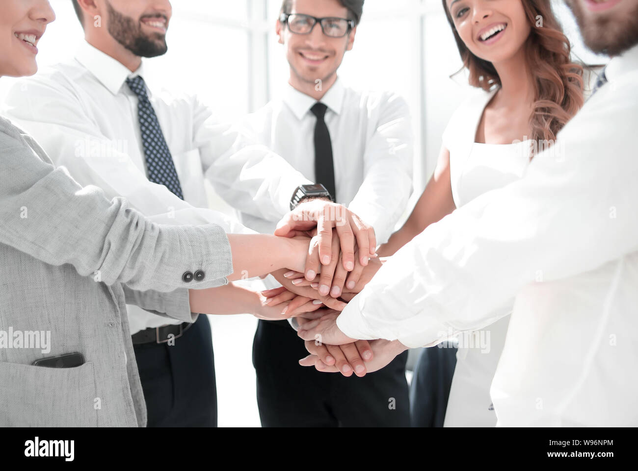 business team showing their unity Stock Photo - Alamy