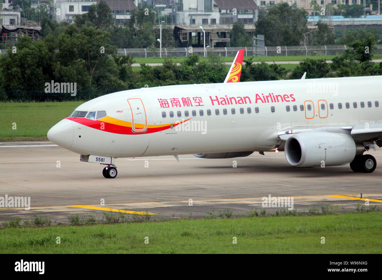 --FILE--A jet plane of Hainan Airlines prepares for take-off at the ...