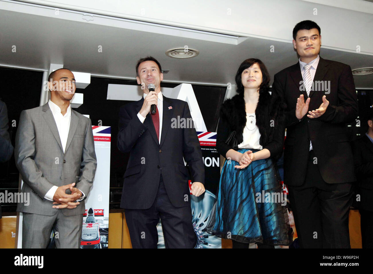 (From right to left) Retired Chinese basketball superstar Yao Ming and ...