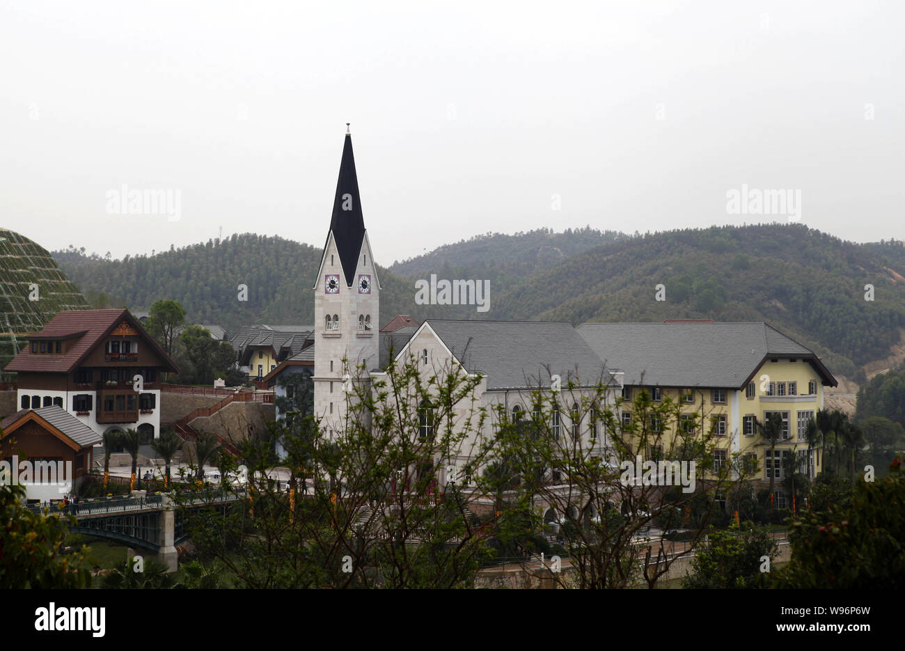 European-style houses are pictured in Hallstatt See, a replica of the ...