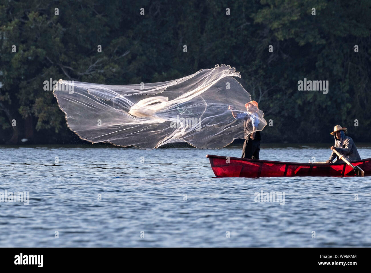 Fishermen use a cast net at Lake Catemaco in Catemaco, Veracruz, Mexico ...