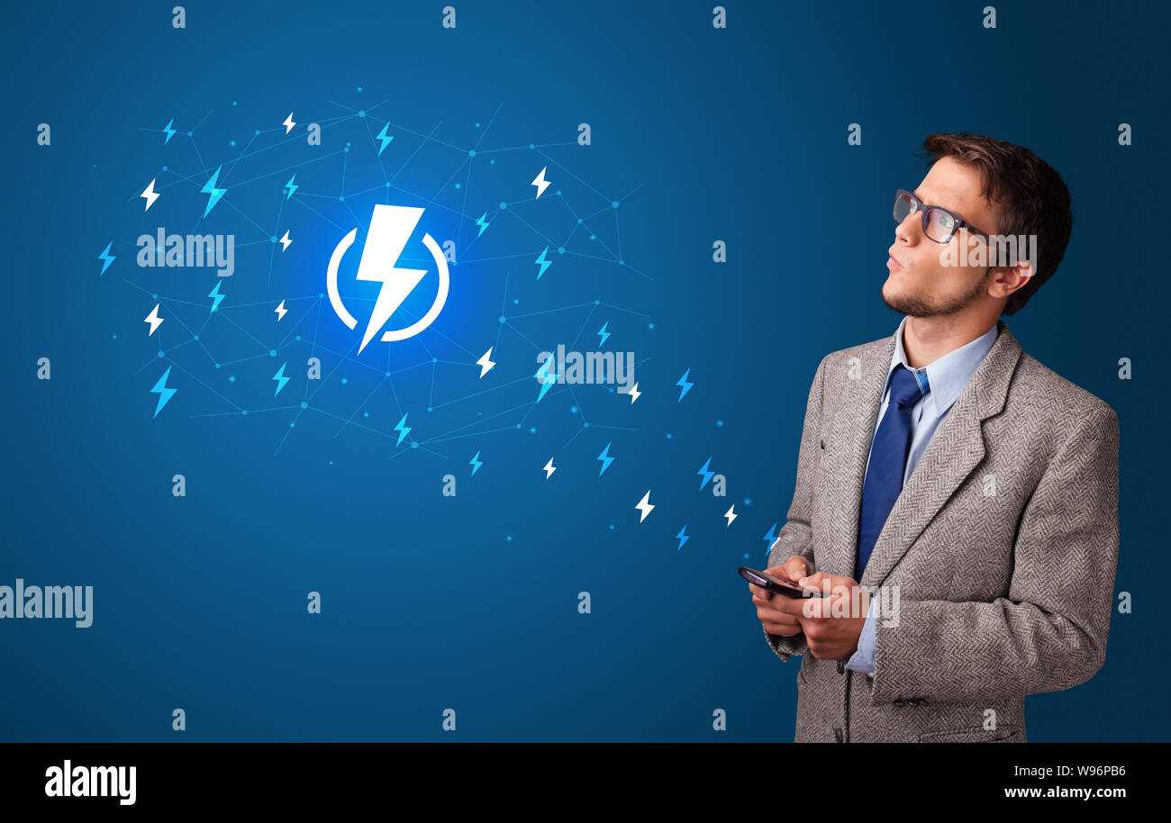 Young person using phone with power concept Stock Photo - Alamy